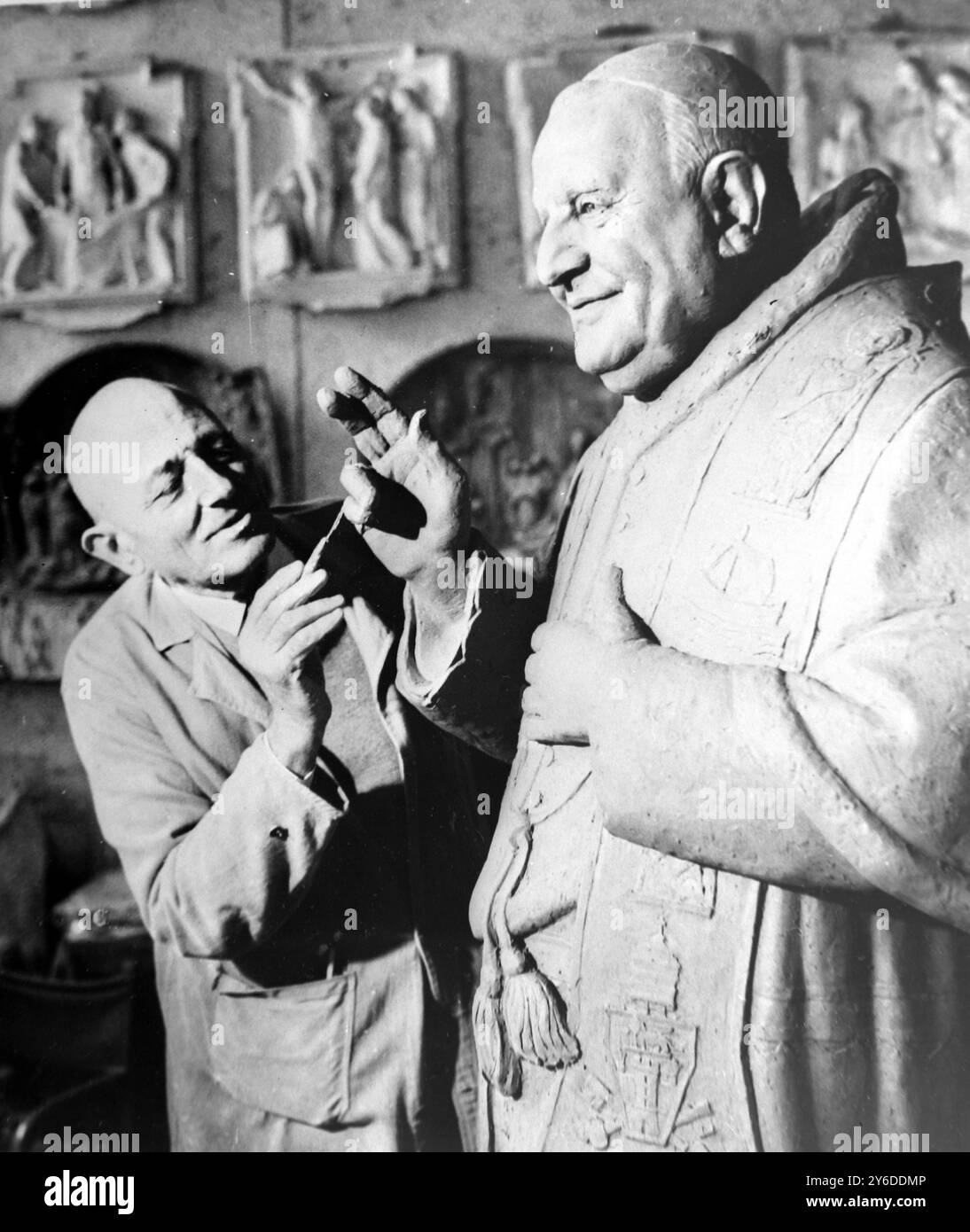 ROMAN SCULPTOR CARLO PISI PREPARING A SCULPTURE OF POPE JOHN XXIII IN ...