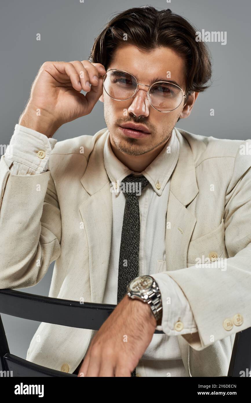 Seated man in formal attire hi-res stock photography and images - Alamy