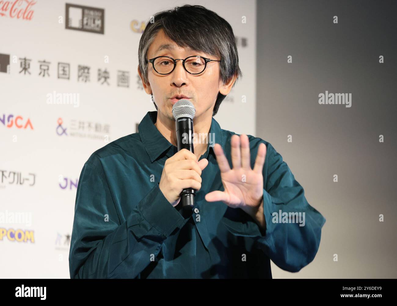 September 25, 2024, Tokyo, Japan - Japanese film director Daihachi Yoshida speaks as he attends ...