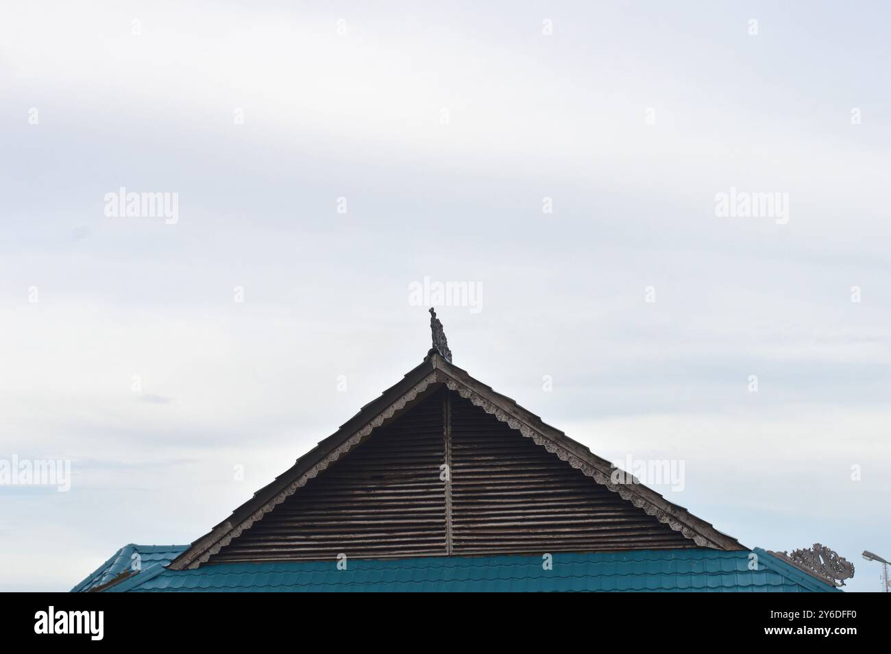 borneo traditional tribal carvings on the roof top of buildings Stock ...