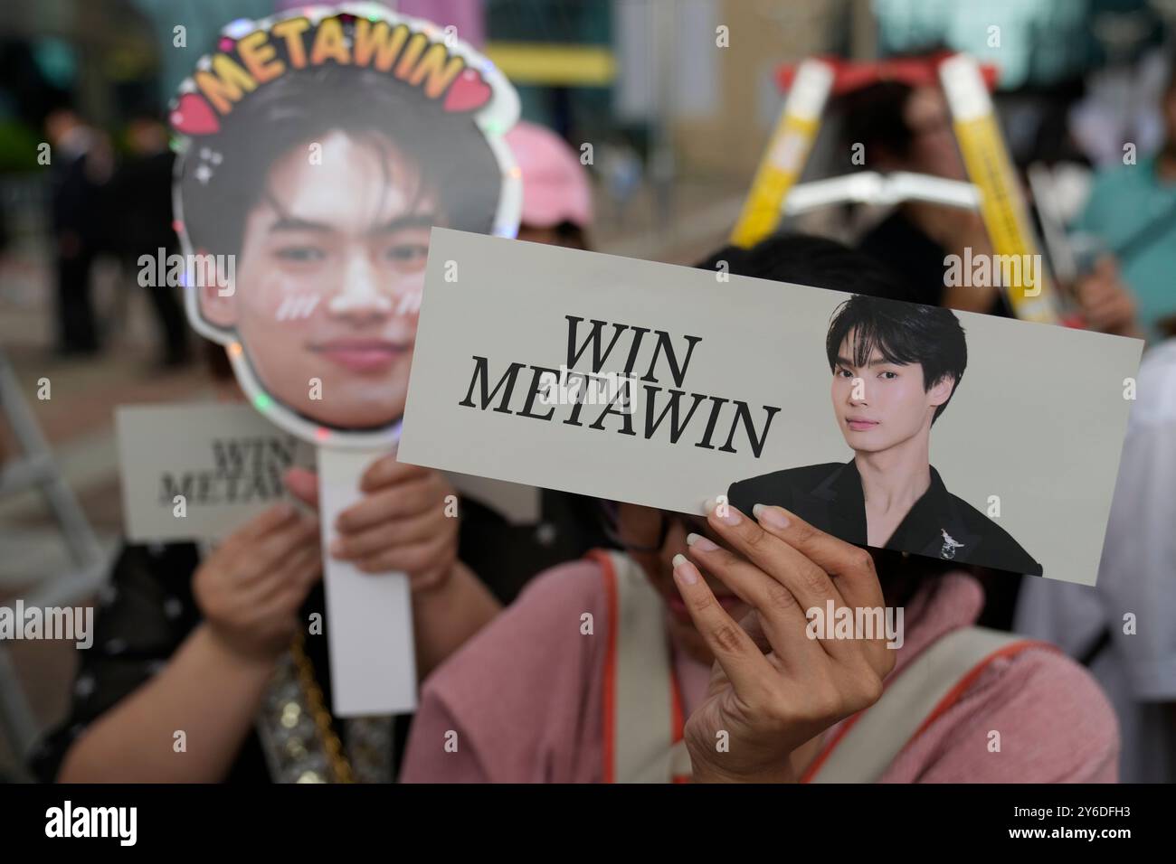 Fans hold cutouts of actor Metawin Opas-iamkajorn, at the Seoul ...
