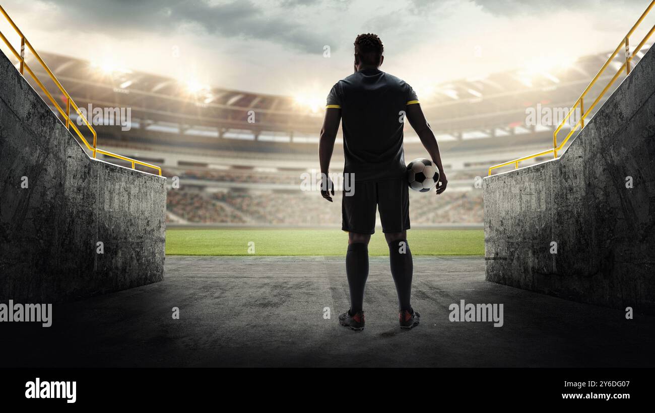 Back view of man, soccer player from Brazil team in dark uniform colors ...