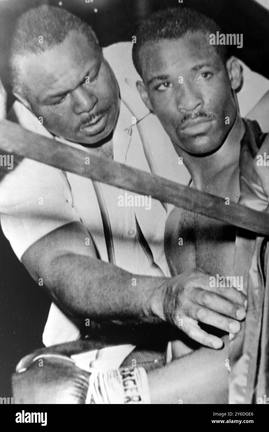ALLAN THOMAS WITH VETERAN BOXER ARCHIE MOORE IN ST LOUIS / ; 15 MAY ...