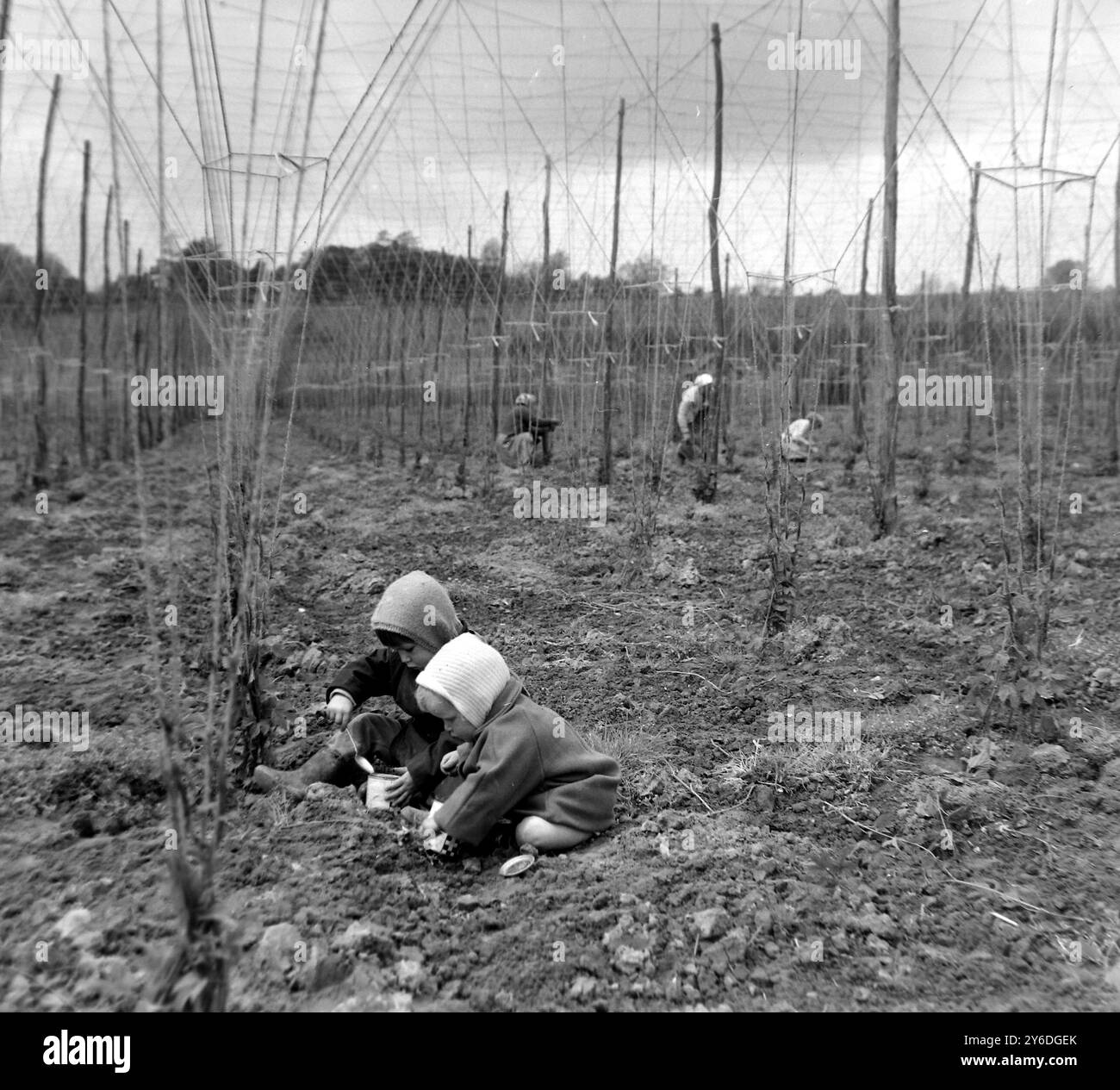 Parents play children in Black and White Stock Photos & Images - Alamy