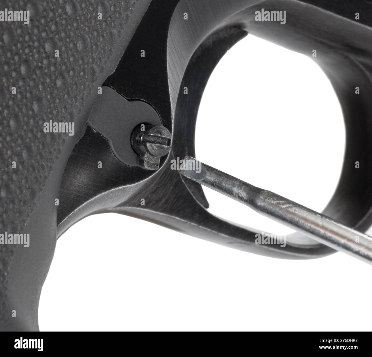 Isolated screwdriver approaching the catch that when turned and with ...