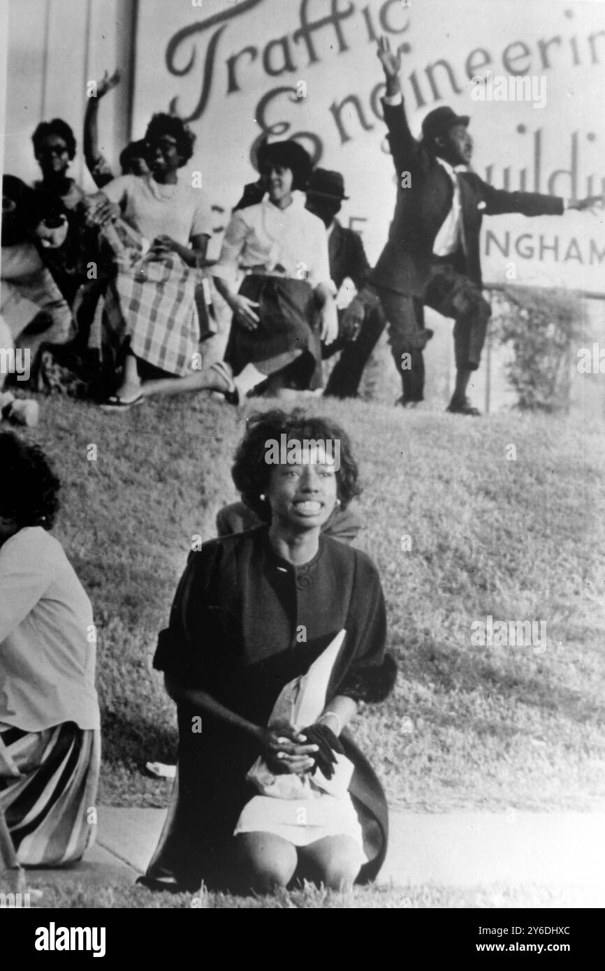 RACIAL SEGREGATION BIRMINGHAM ALABAMA YOUNG BLACK WOMAN KNEELING IN ...