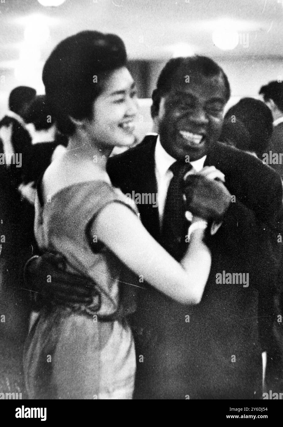 JAZZ MUSICIAN LOUIS ARMSTRONG DANCING WITH HISANAGA SHIMAZU IN TOKYO ...