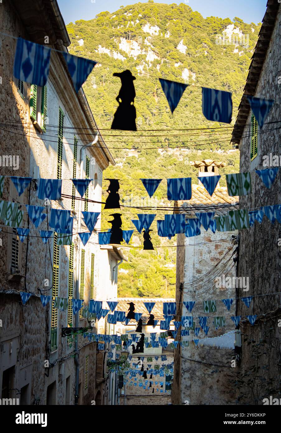 Beautiful pennants hanging on a street in a town in Spain expressing ...