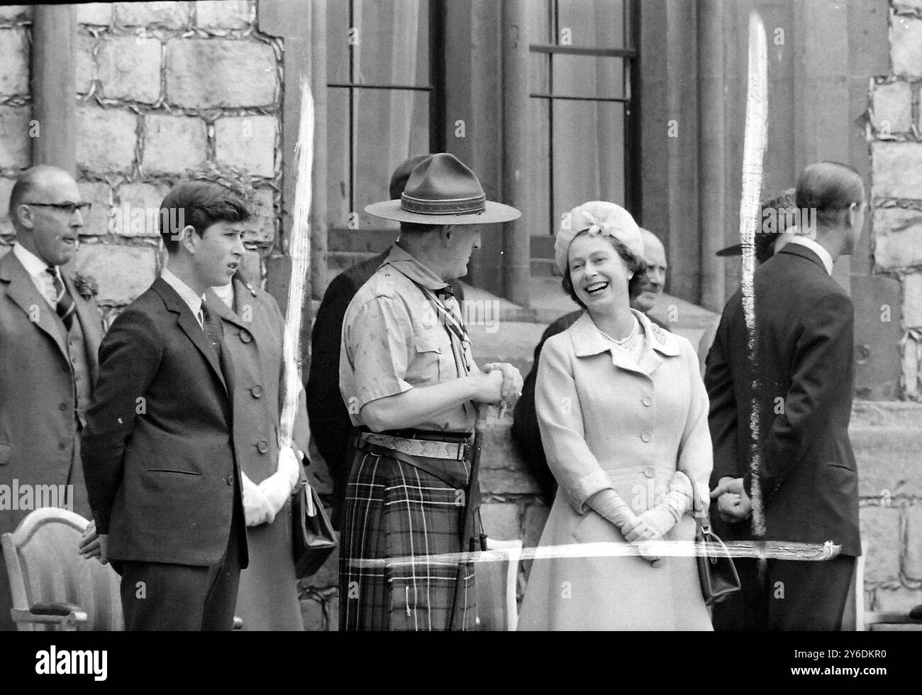 QUEEN ELIZABETH II AND PRINCE PHILIP WITH PRINCESS ANNE WATCH SCOUTS ...