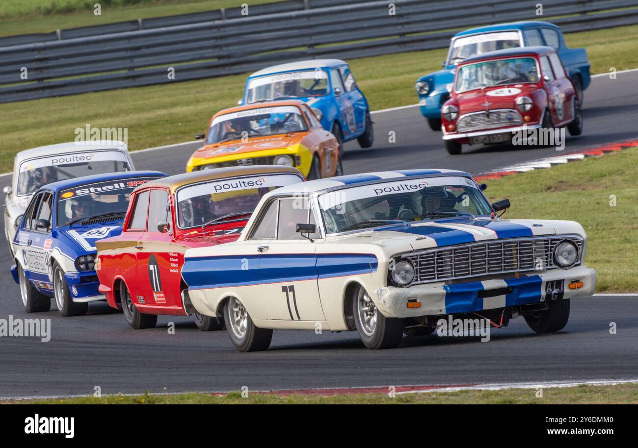 Alan Greenhalgh leads out of Palmer in his Ford Falcon Sprint during ...
