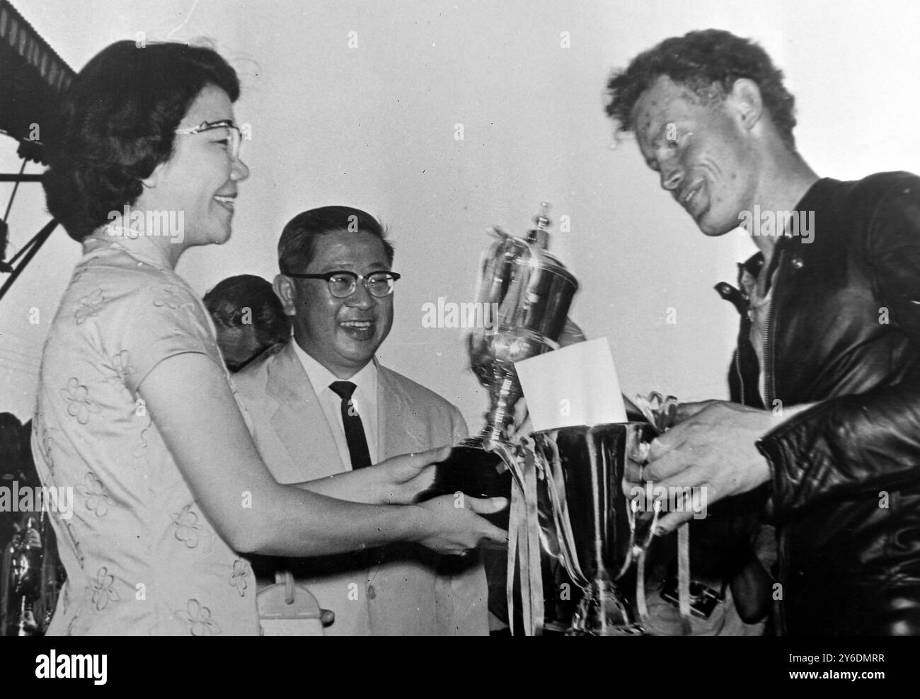MOTOR CYCLING MALAYSIA GP CHRIS CONN GETS TROPHY FROM PANG BOON AFTER ...