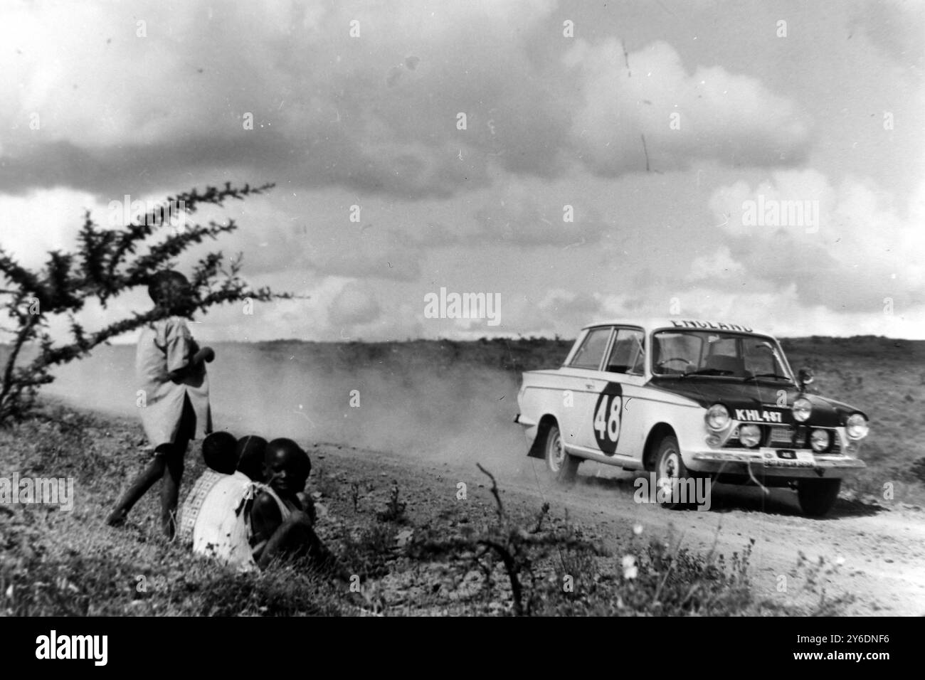 MOTOR RALLY EAST AFRICAN SAFARI PAT MOSS IN CAR CLOUD DUST ; 10 APRIL ...