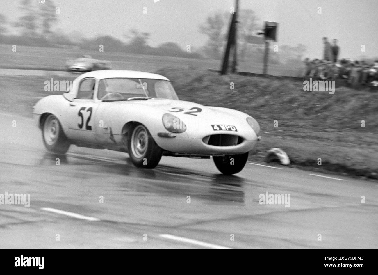 RACING DRIVER GRAHAM HILL DRIVES JAGUAR E TYPE JAG / ; 1 APRIL 1963 ...