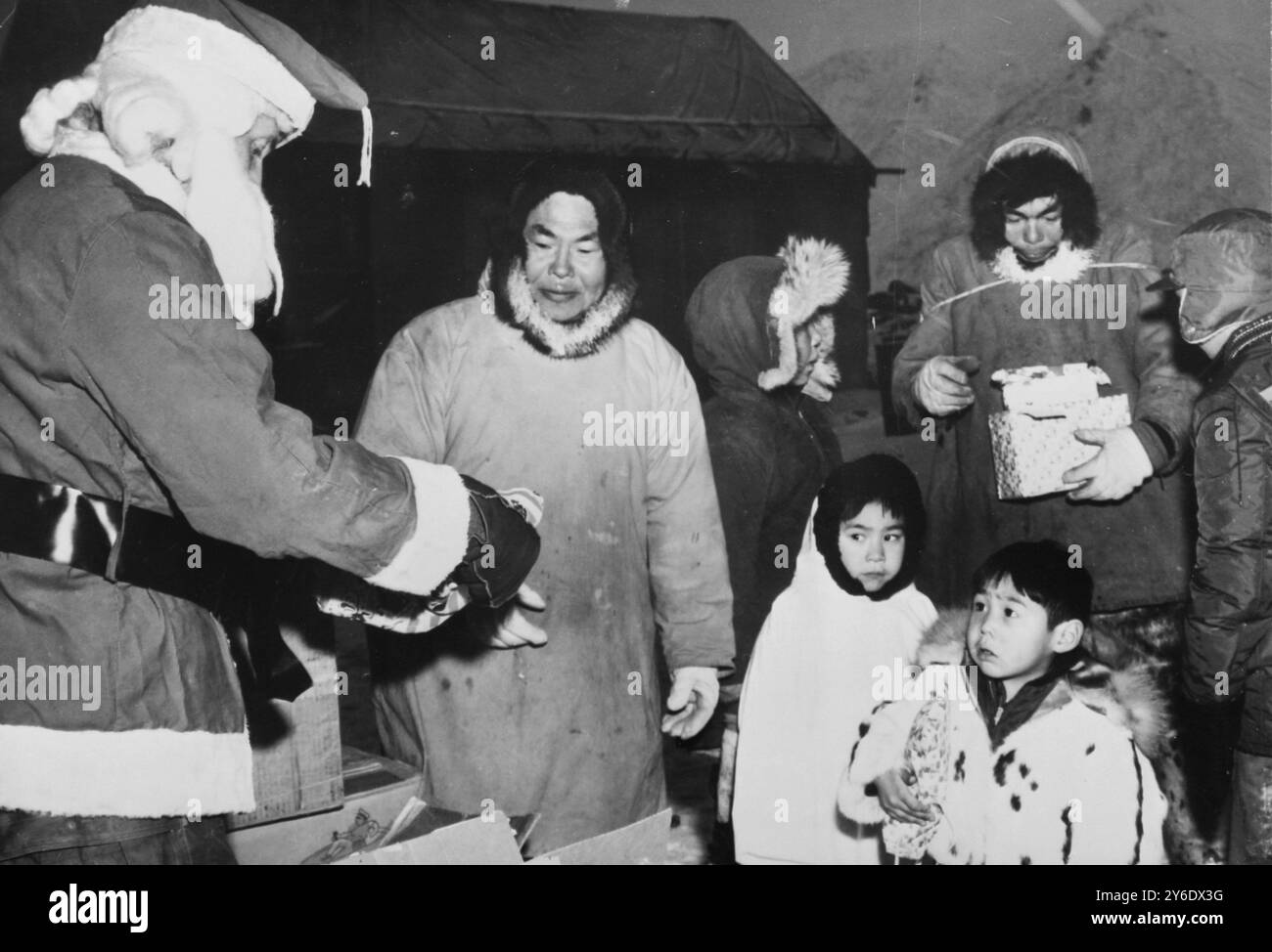 CHRISTMAS SANTA CLAUS VISITS CHILDREN IN ALASKA ; 5 MARCH 1963 Stock ...