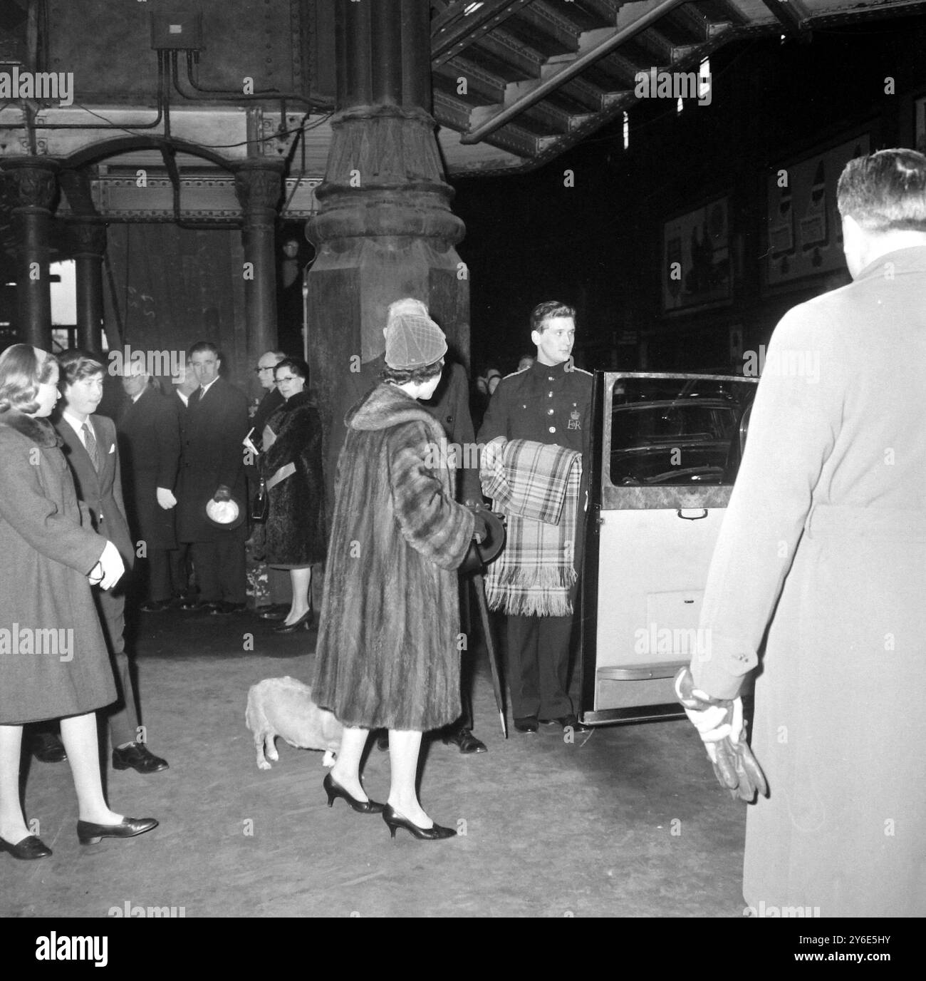 QUEEN ELIZABETH II WEARING HAT, FUR COAT AT LIVERPOOL STEET STATION ...