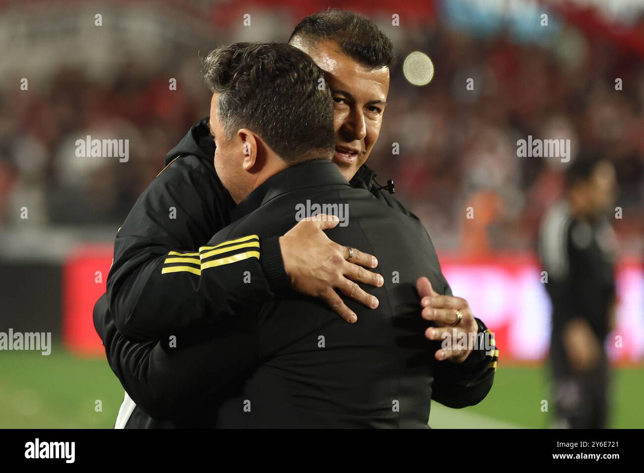 Chile's Colo Colo Argentine head coach Jorge Almiron (R)hughs his ...