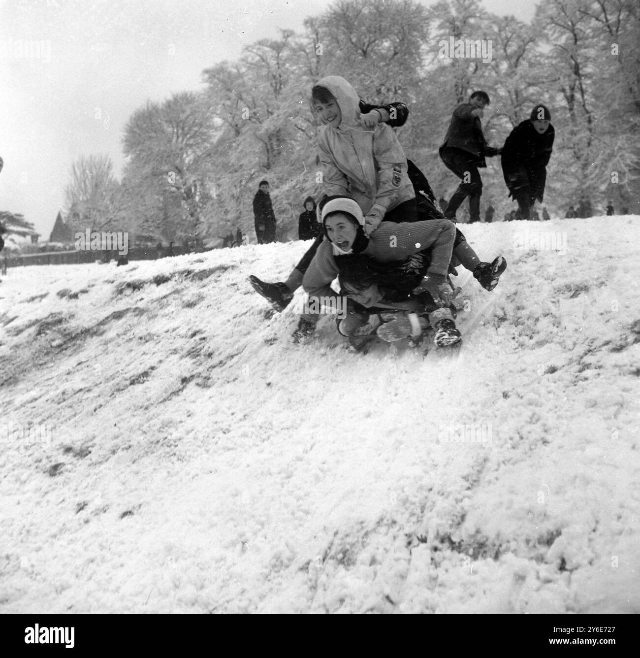 HAMPSTEAD YOUNG SPORTSMEN ENJOYING SNOW SCENE SNOW AND WINTER IN LONDON ...