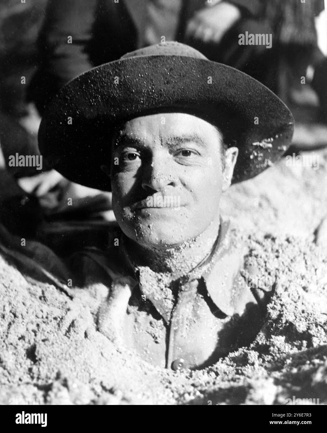 19 DECEMBER 1962 BOB HOPE EMERGING FROM THE SAND DURING THE FILMING OF ...