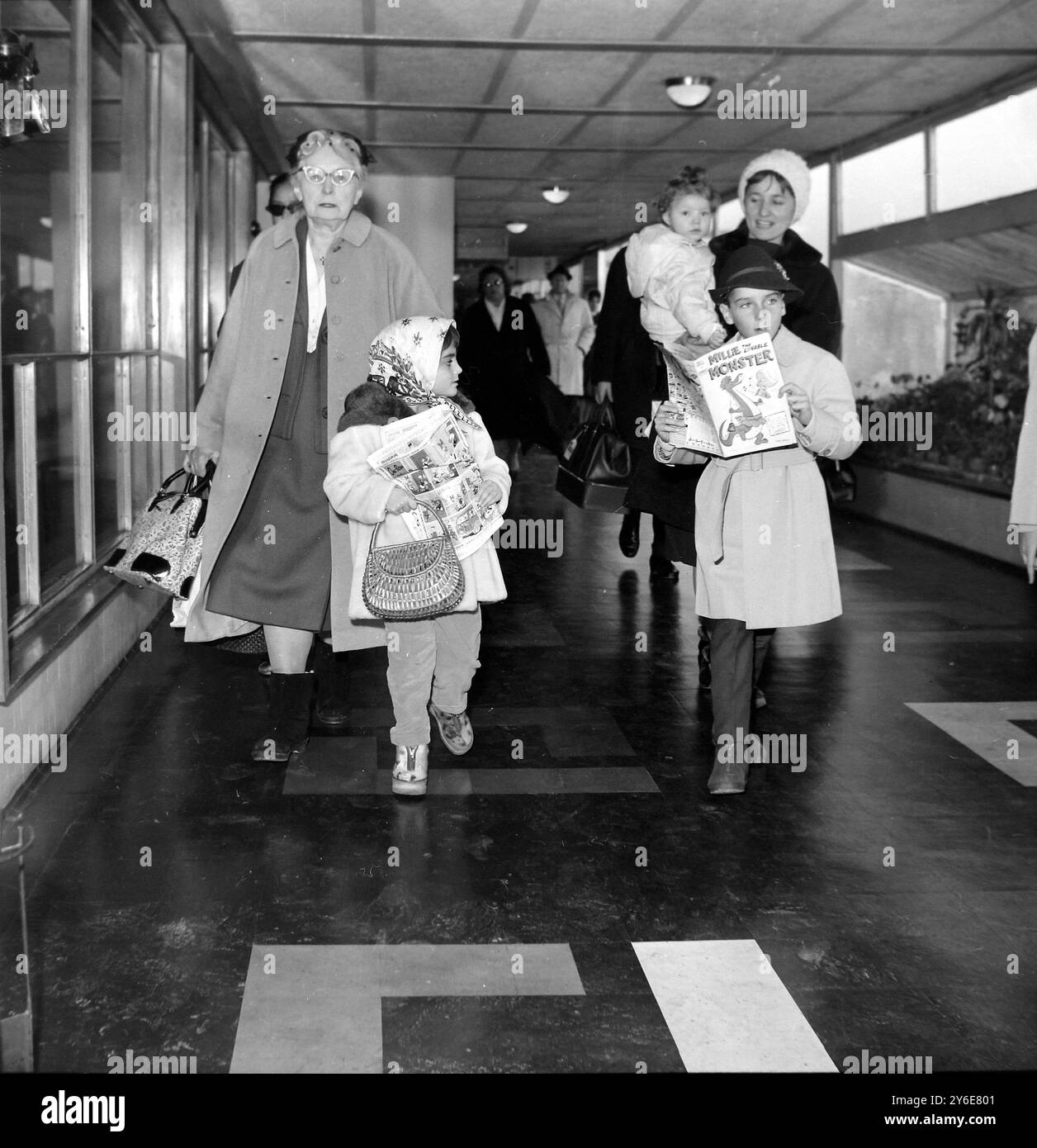 MARIA FISHER AND CHRISTOPHER WILDING AT LONDON AIRPORT / ; 17 DECEMBER ...