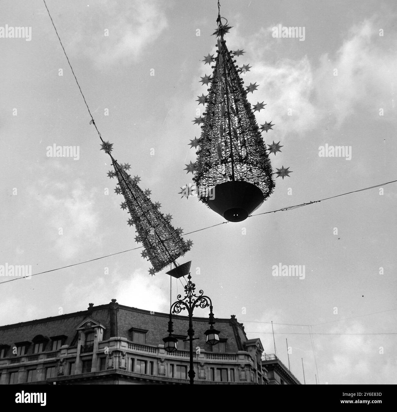 OXFORD CIRCUS CHRISTMAS XMAS TREES UNDER STRAIN OF FREAK GALES LONDON ...
