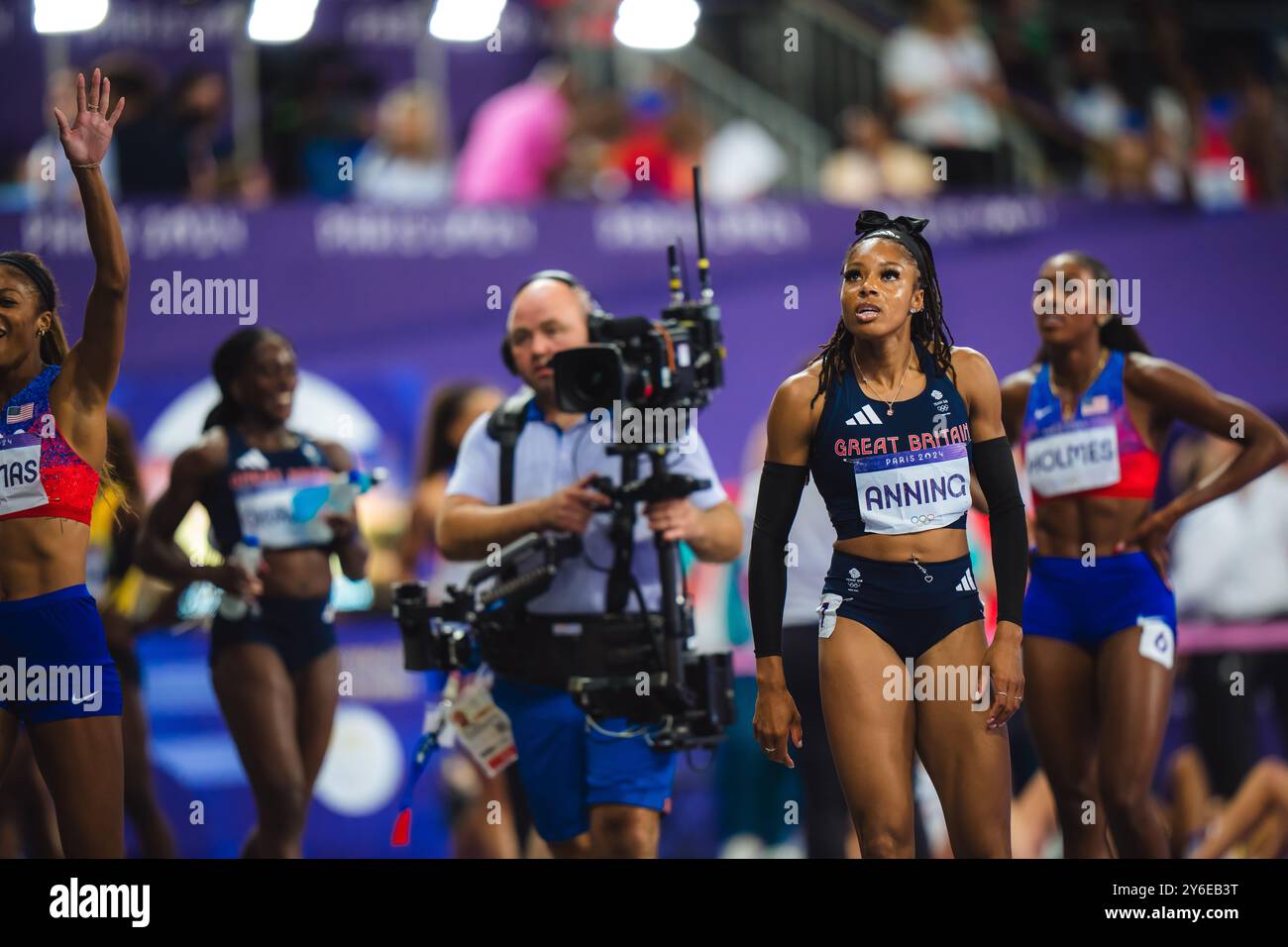 Amber Anning participating in the 4X400 meters relay at the Paris 2024 ...