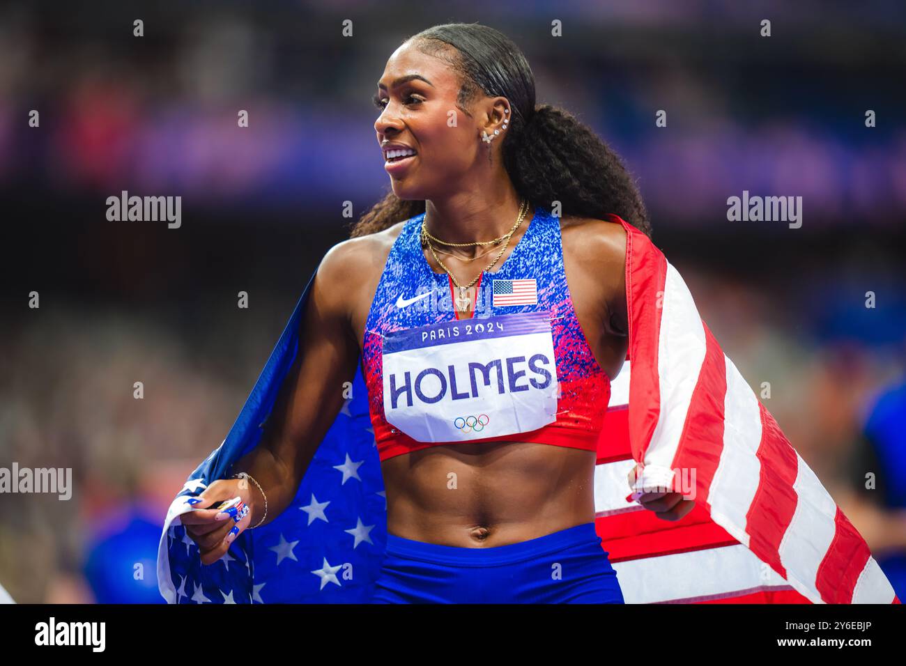 Alexis Holmes participating in the 4X400 meters relay at the Paris 2024 ...