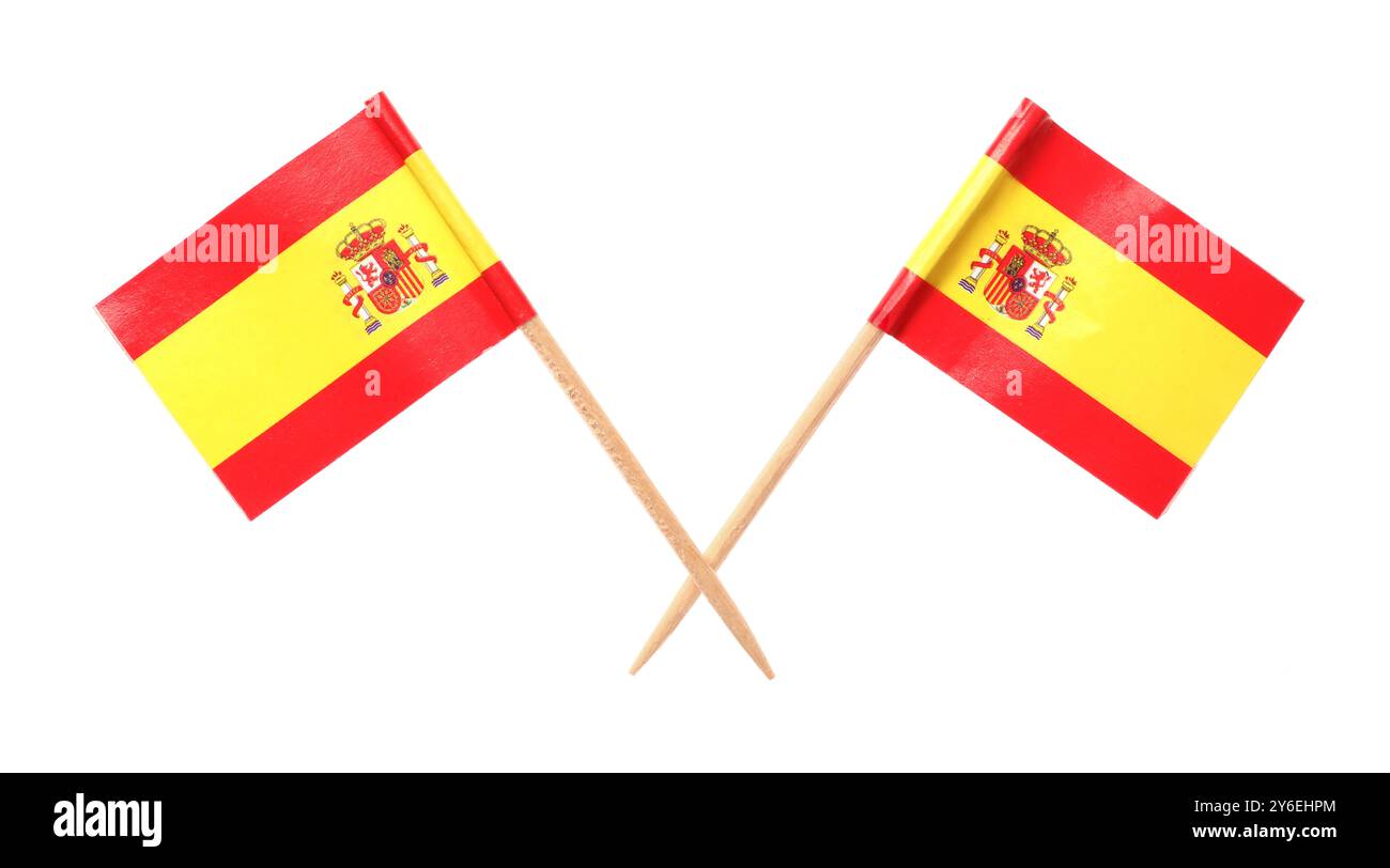 Small paper flags of Spain isolated on white Stock Photo - Alamy