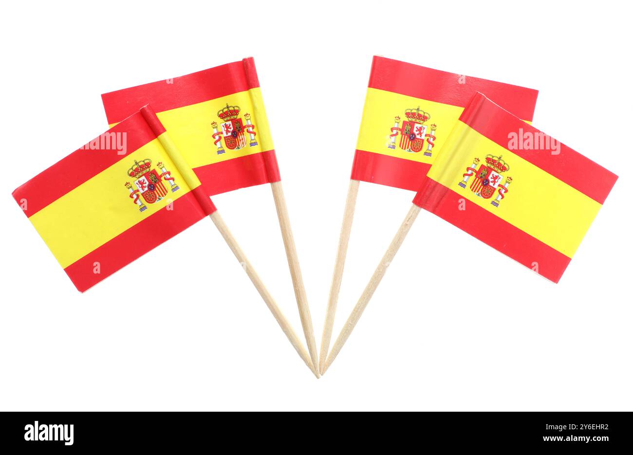 Small paper flags of Spain isolated on white Stock Photo - Alamy