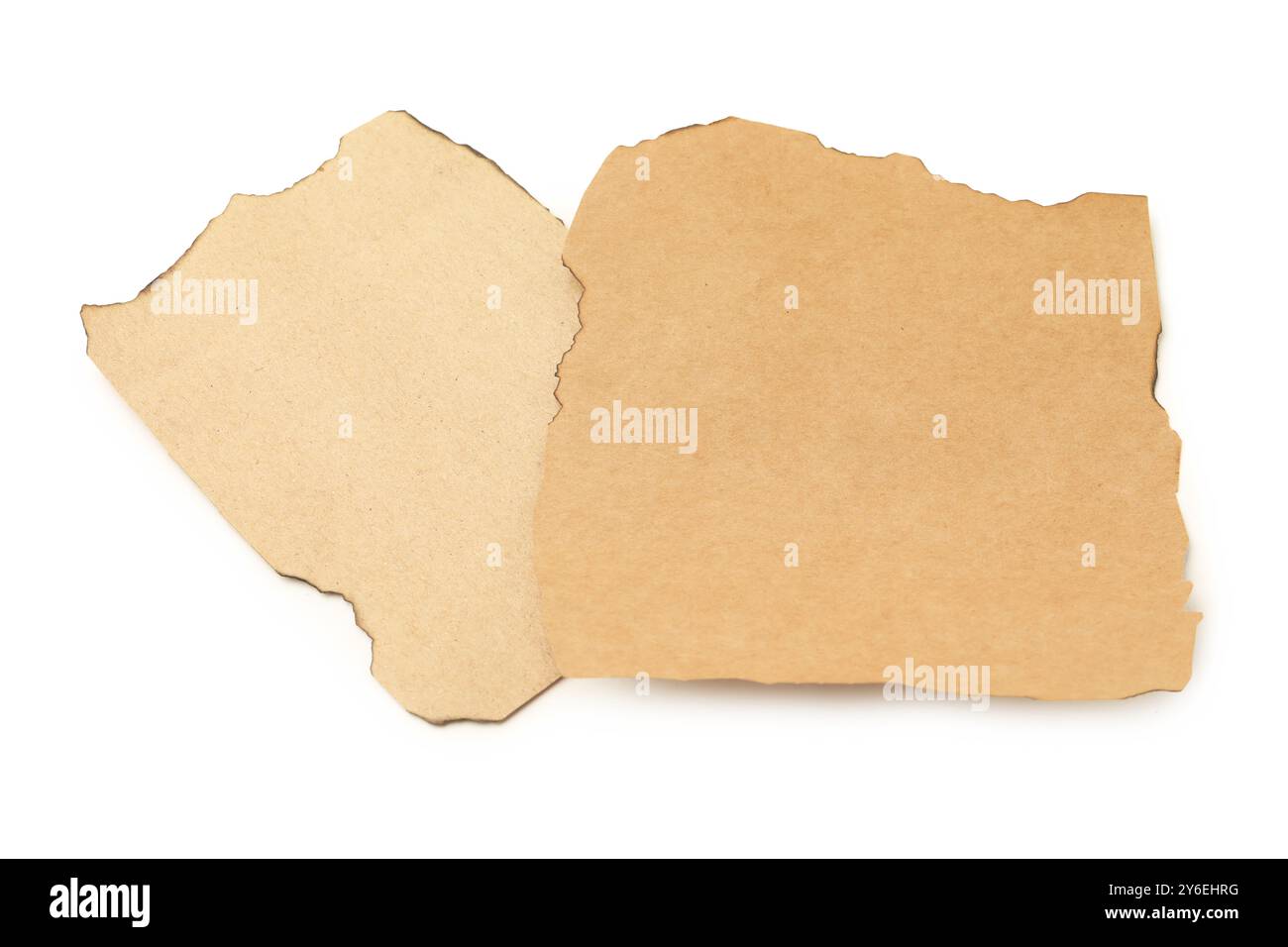 Pieces of old paper with dark burnt borders isolated on white Stock ...