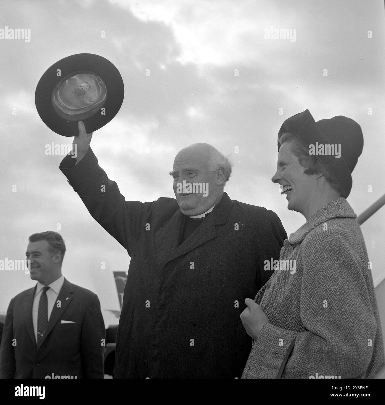 ARCHBISHOP OF CANTERBURY MICHAEL RAMSEY WITH WIFE AT LONDON AIRPORT ...