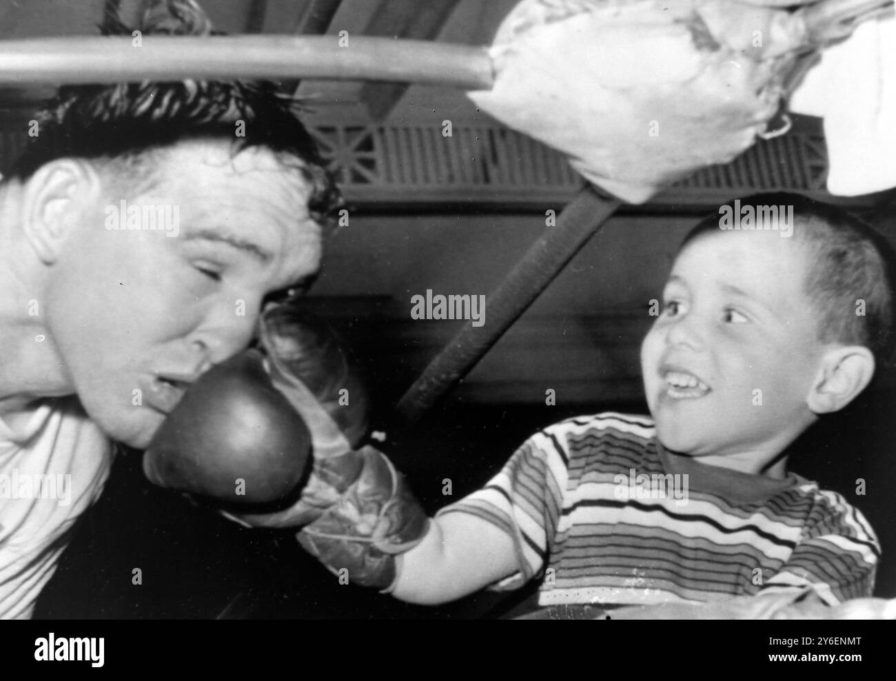 BOXER GENE FULLMER WITH SON DELAUN IN SAN FRANCISCO / ; 11 OCTOBER 1962 ...