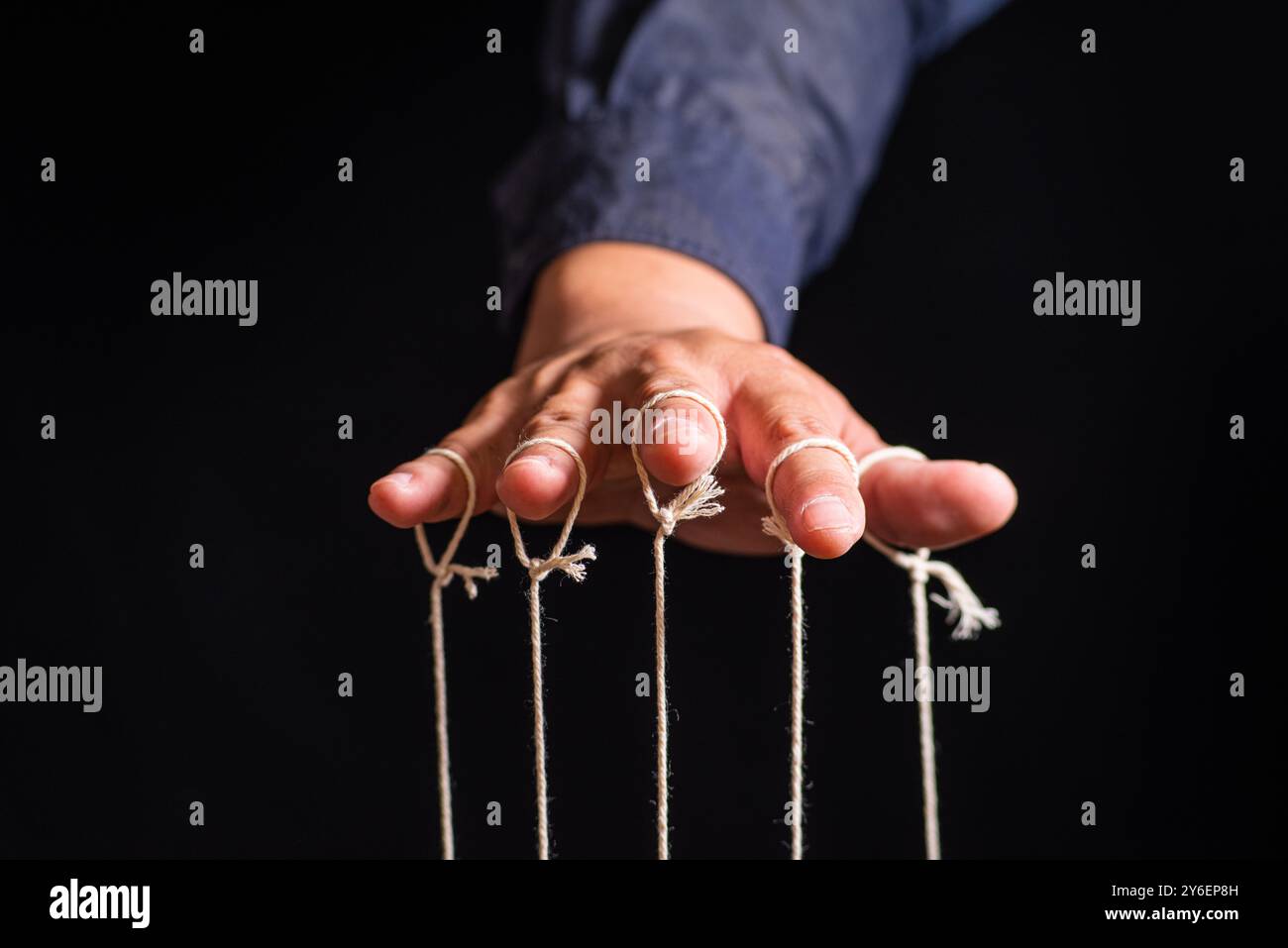 Close-up Of Man Controls The Puppet With Fingers. Man`s Hand Controls ...