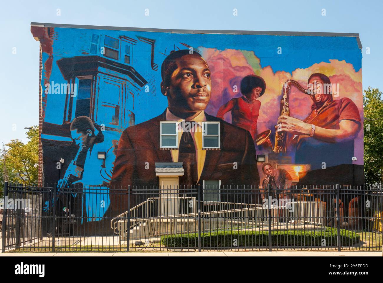 Garden wrought iron fence wife culture musician stages wife playing hi-res stock photography and ...