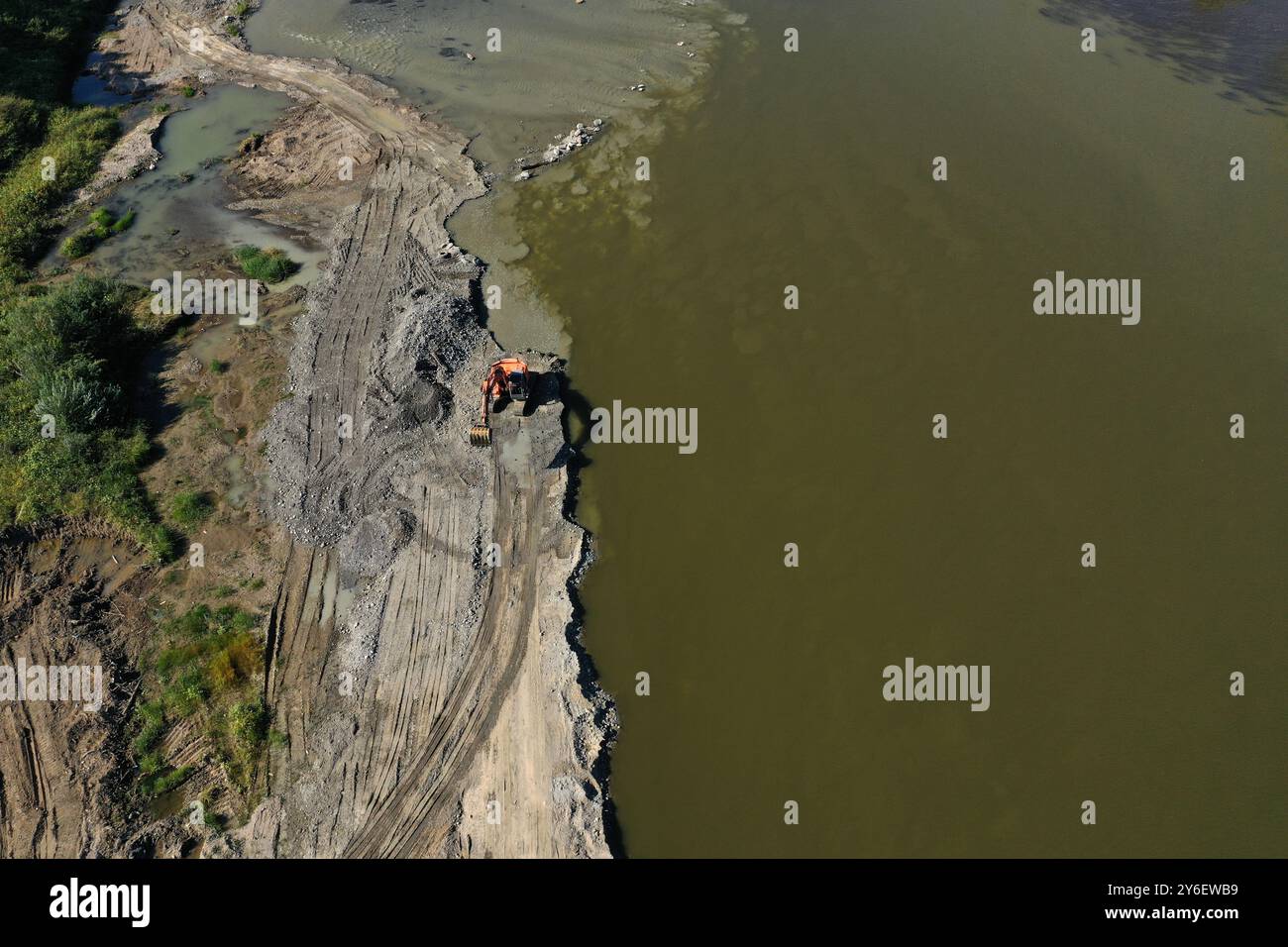 Aerial view of illegal exploitation of river sand and gravel with ...