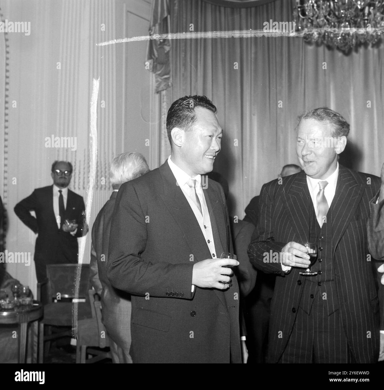 HUGH GAITSKELL AT A DINNER WITH LEE KUAN YEW OF SINGAPOER IN LONDON ...