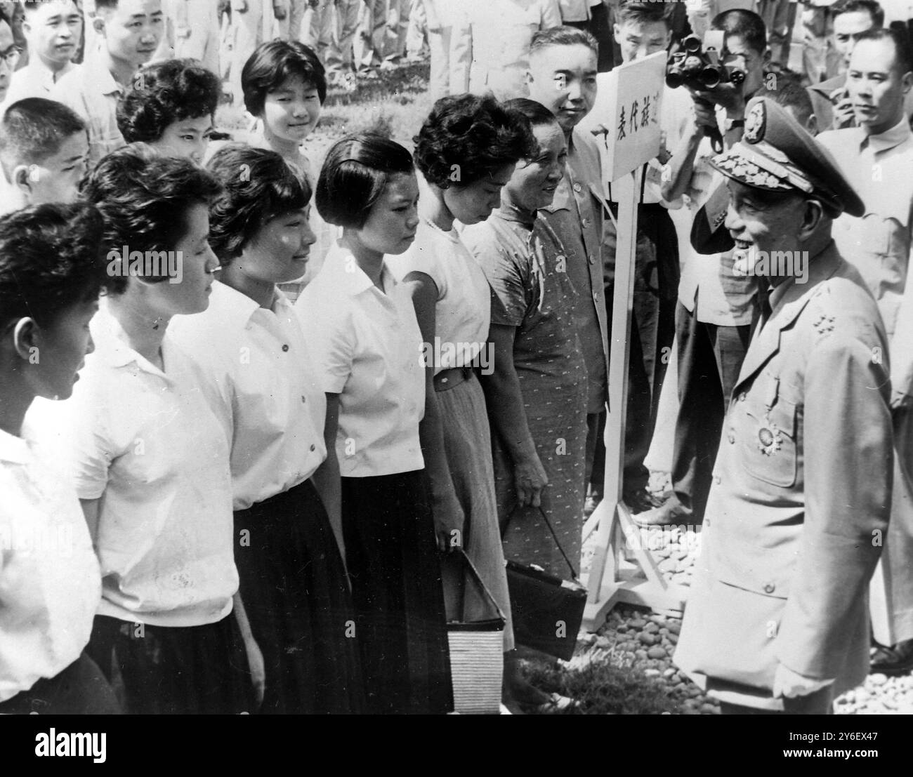 PRESIDENT CHIANG KAI SHEK MEETS FAMILIES OF REVOLUTION IN TAIPEI / ; 10 ...