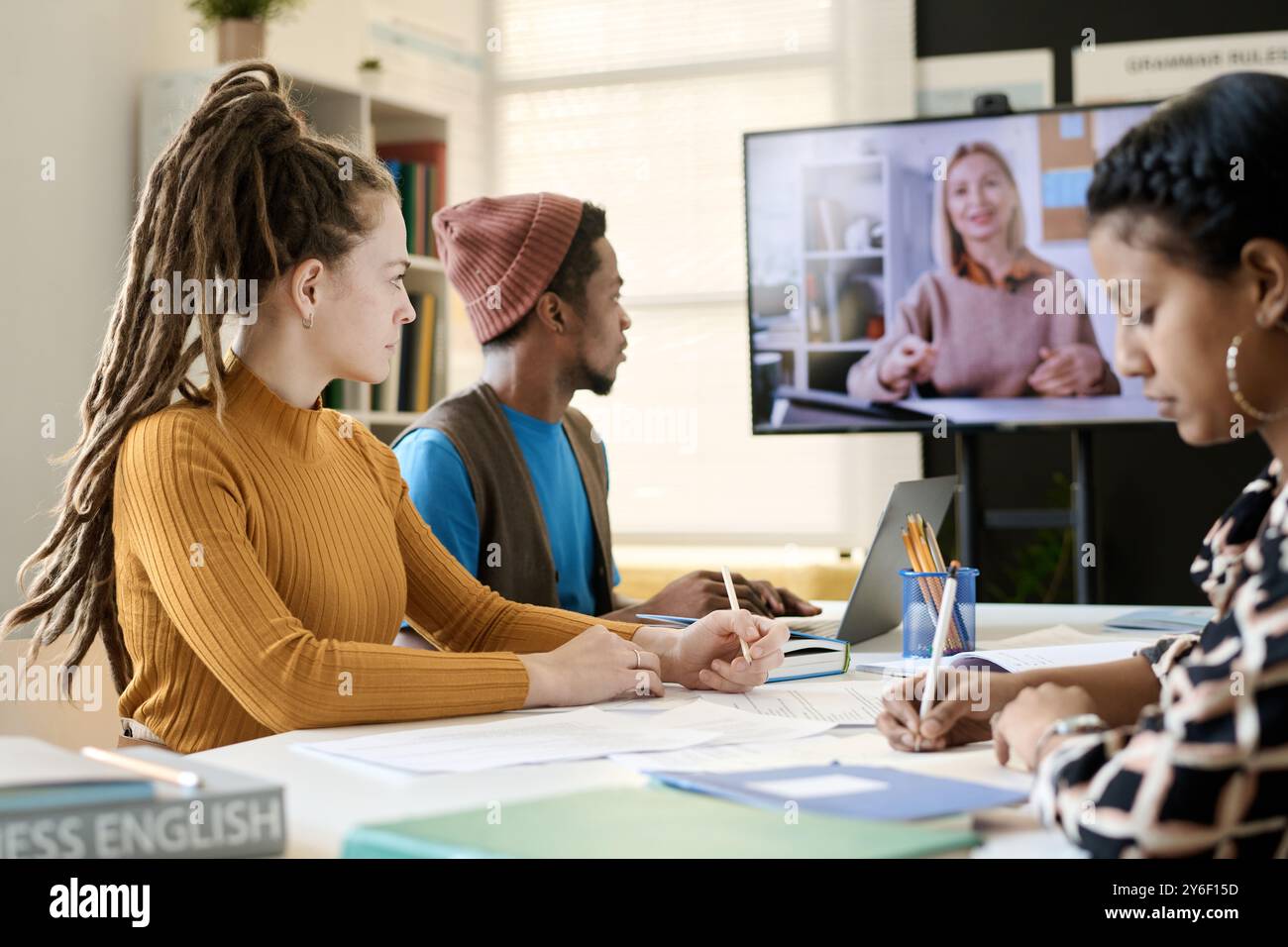 Students Watching Online Lesson in Class Stock Photo - Alamy