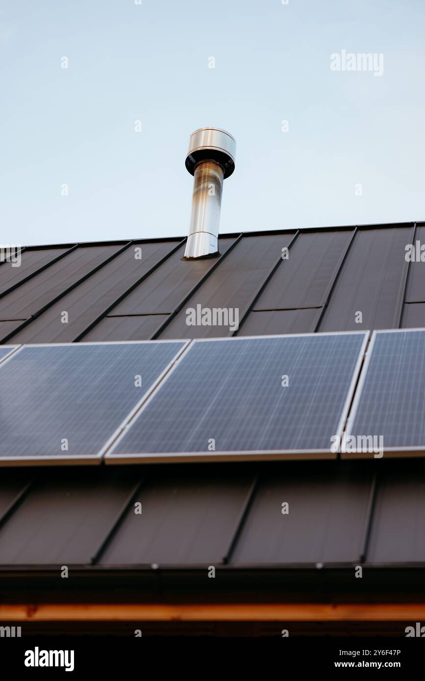 Rooftop chimney solar cells hi-res stock photography and images - Alamy