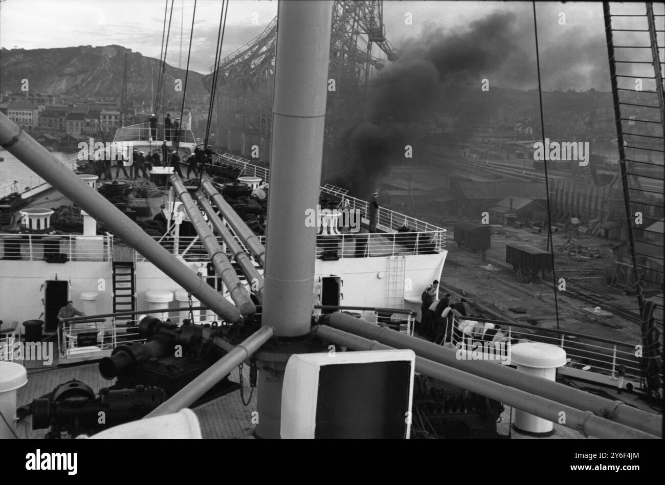 The Queen Mary Ocean Liner pulls into port in Europe C. April 1952 ...