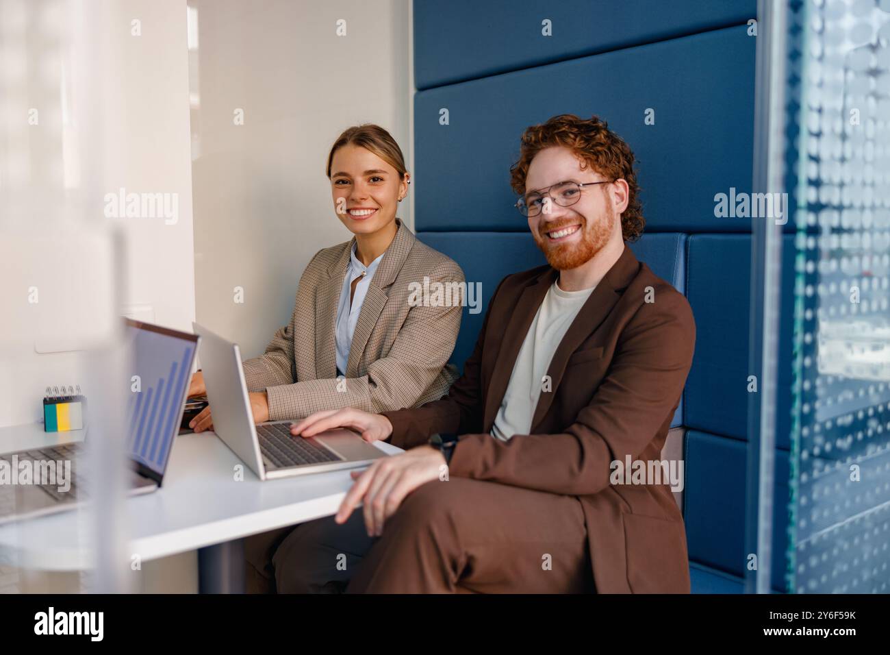 Modern Business Partners Collaborating Together in a Stylish and ...