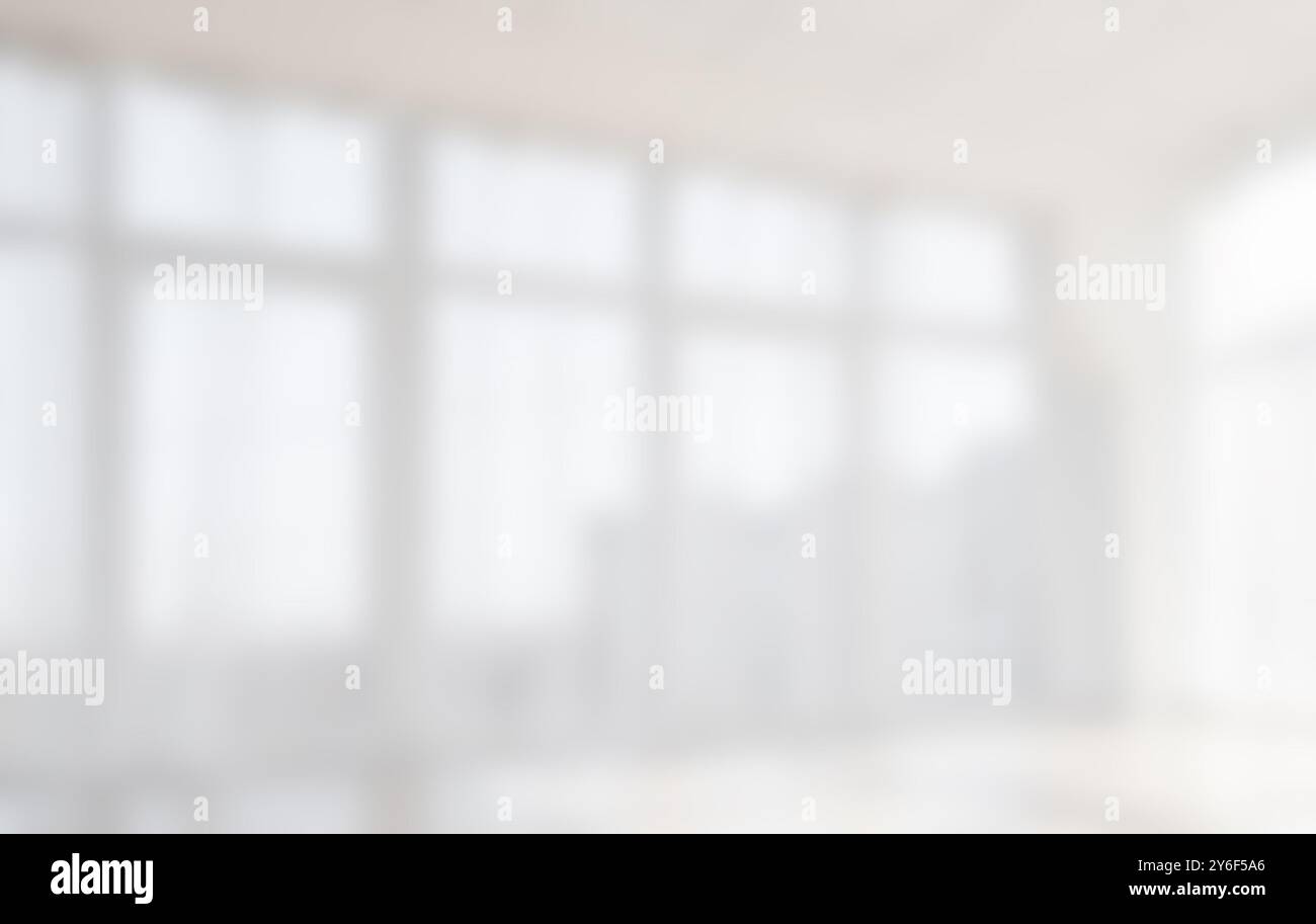 Background of blurred White empty light room with big panoramic windows ...