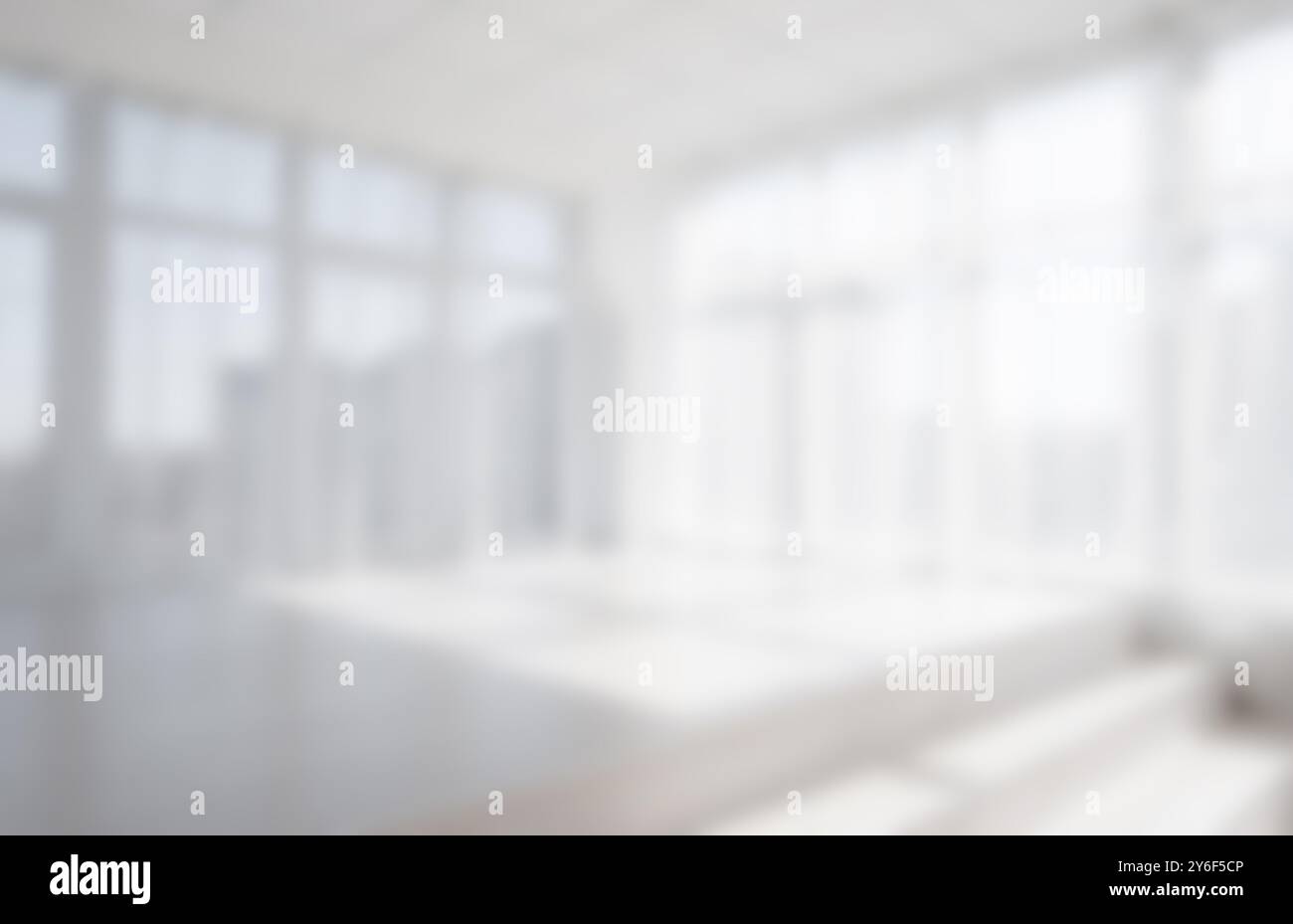 Background of blurred White empty light room with big panoramic windows ...