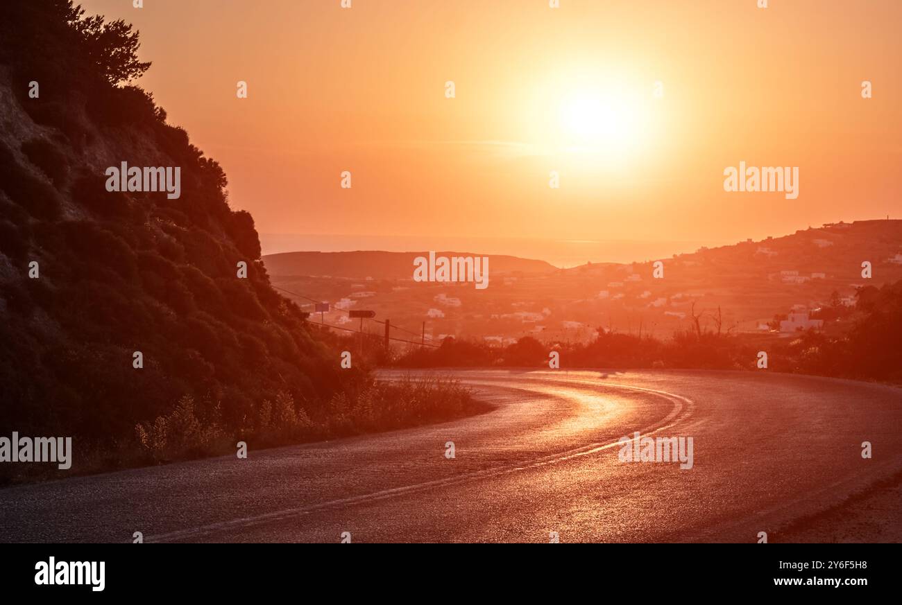 Curved asphalt road running hi-res stock photography and images - Alamy