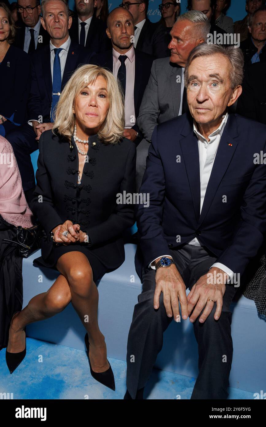 Brigitte Macron, left, and Bernard Arnault attend the Christian Dior ...