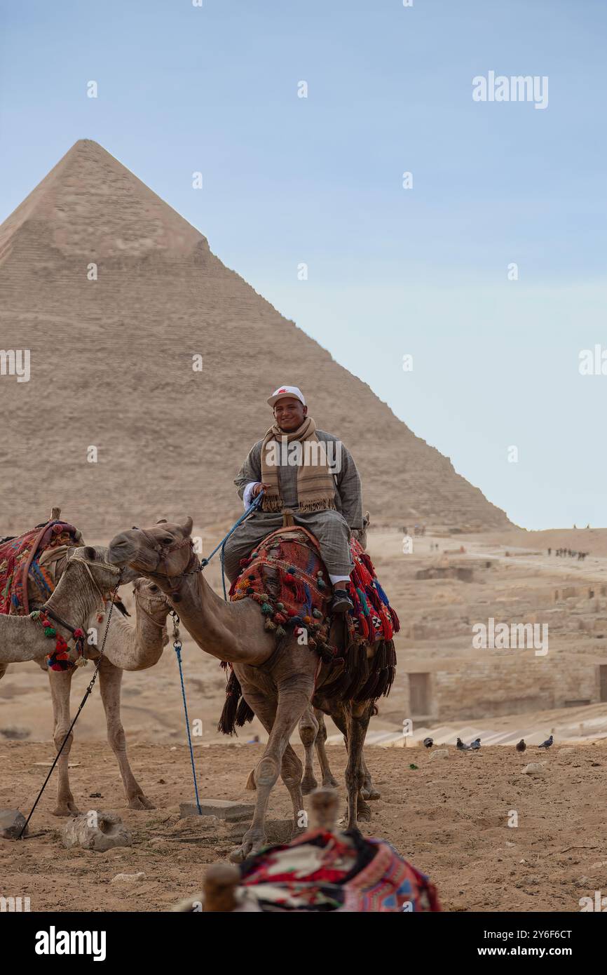 Mounted Camel at Giza pyramids Stock Photo - Alamy