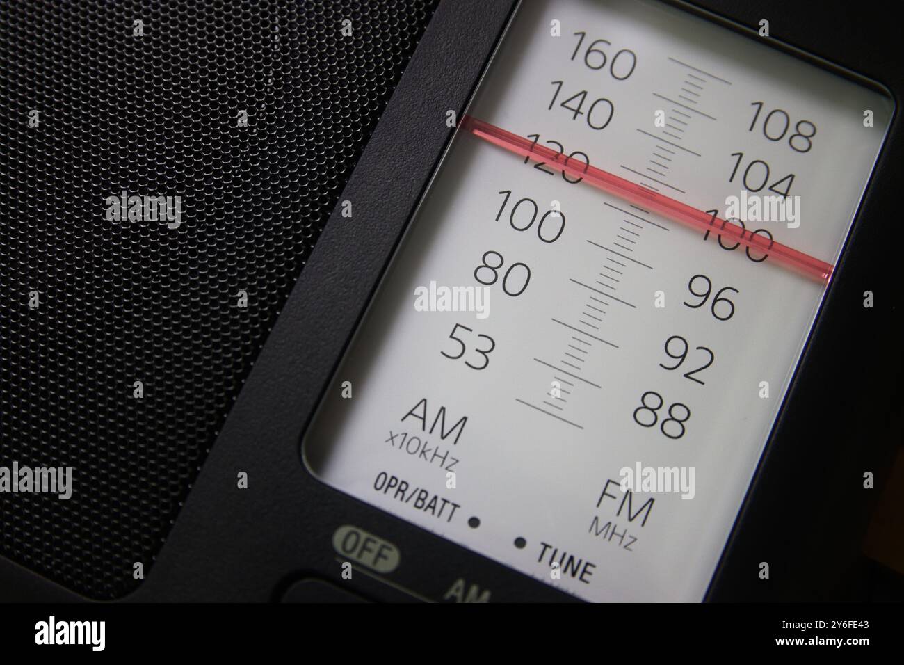 Image of an analogue dial on a portable radio with lines and markings ...