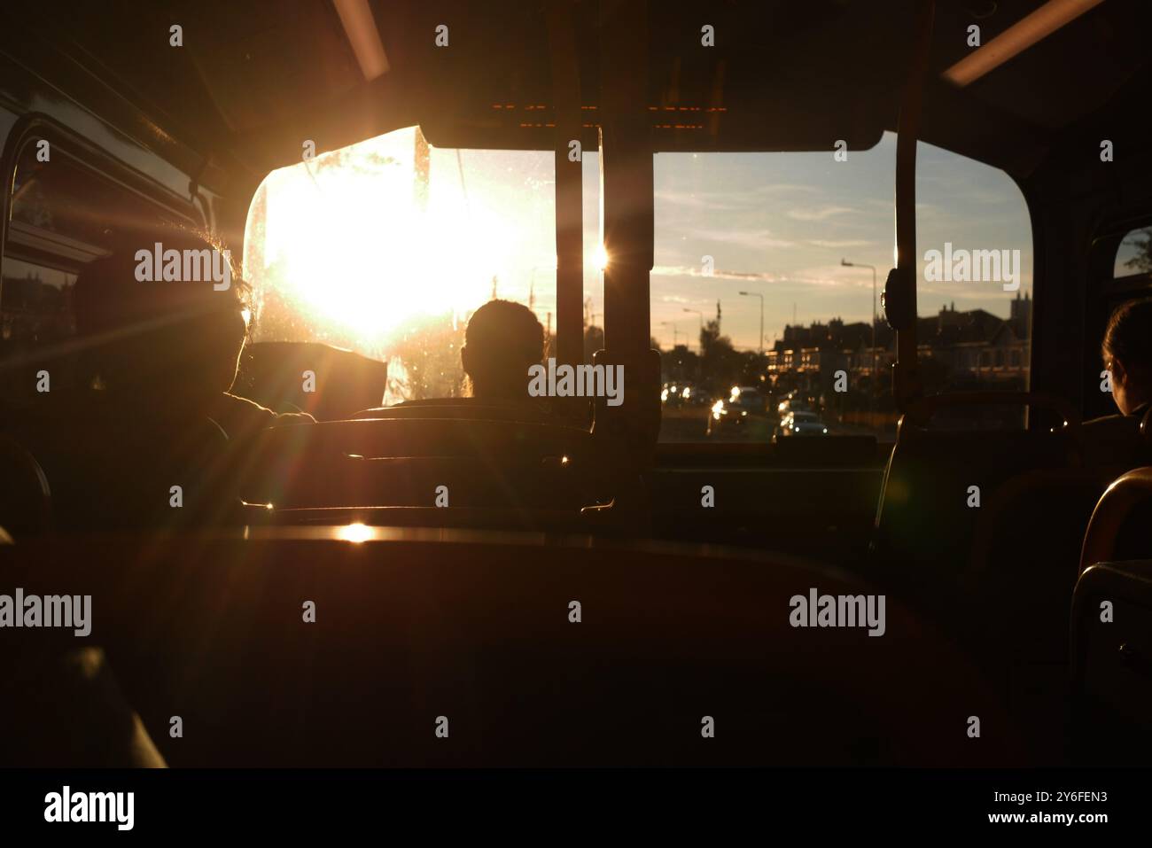 On the bus in Dublin Ireland with the autumnal sun streaming in through ...