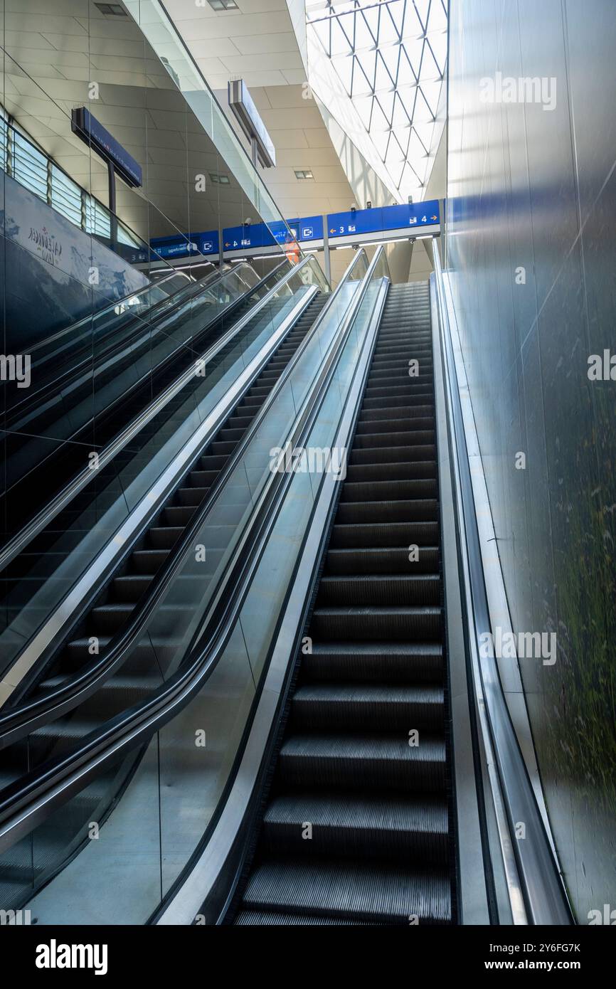 Modern escalators in train hi-res stock photography and images - Alamy