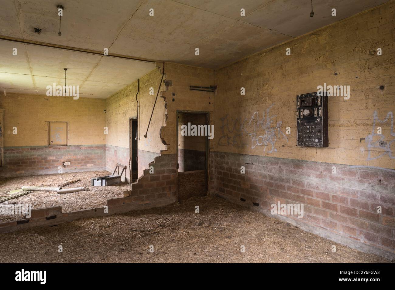 Abandoned empty room in a military barracks Stock Photo - Alamy