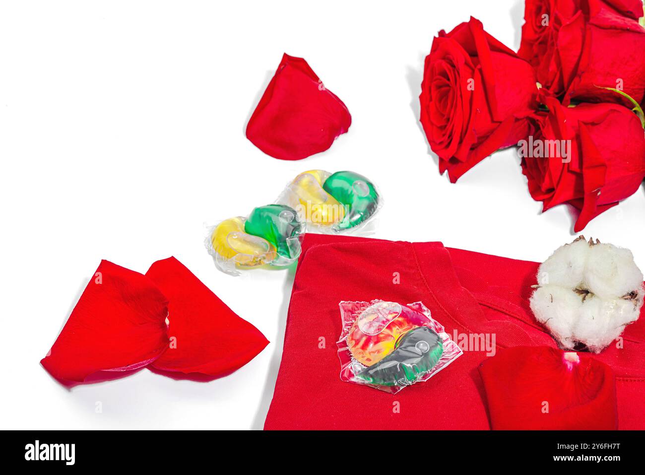 Eco-friendly clothes cleaning, capsules for machine washing. Bright red ...